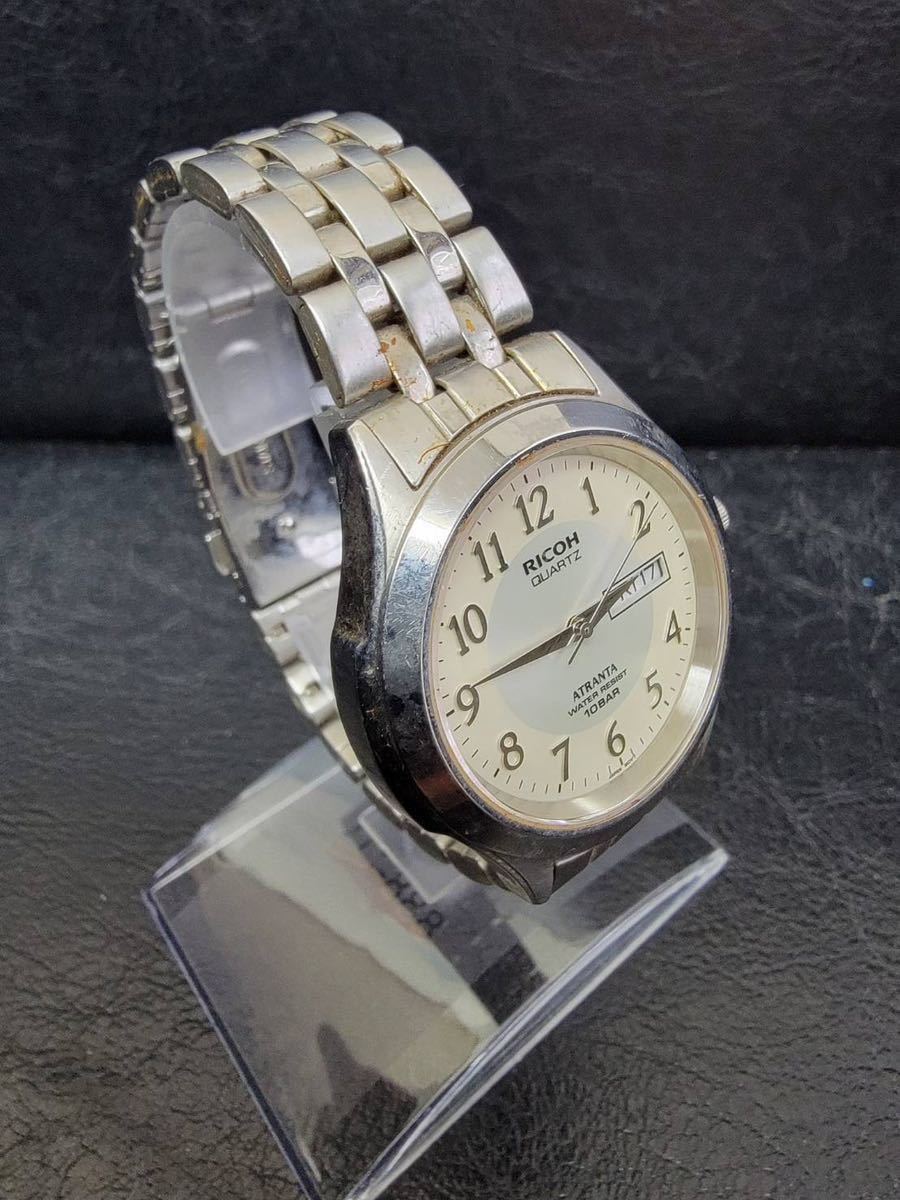 【傷や汚れあり】【1円スタート】RICOH リコー アトランタ 350006 メンズ クォーツ 3針 デイデイト 腕時計 稼働品の落札情報詳細 - ヤフオク落札価格検索 オークフリー