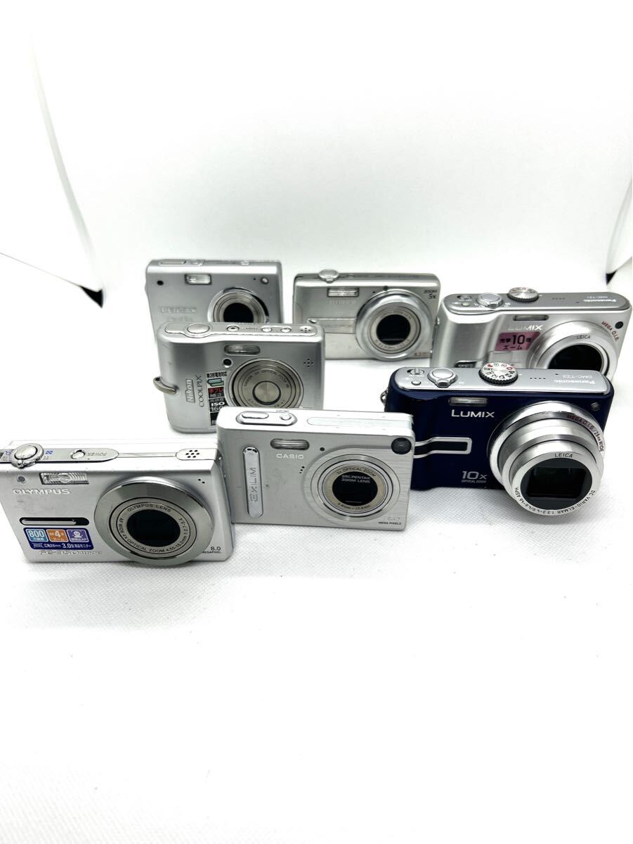 【やや傷や汚れあり】★大特価★ ジャンク デジカメ まとめ casio OLYMPUS Nikon Panasonic PENTAX コンデジ セット 7台 LUMIX coolpix ...