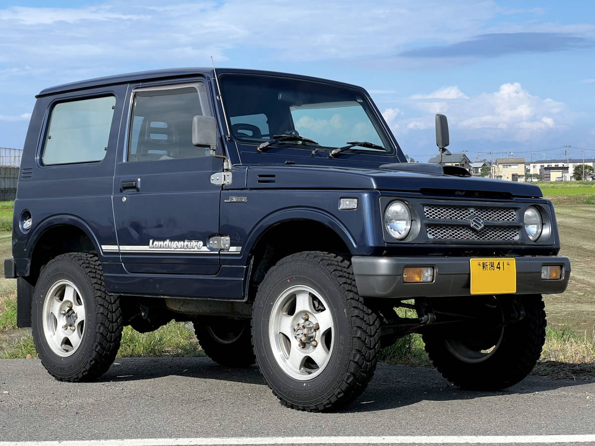 【走行距離 69,700 km】スズキ SUZUKI JIMNY ジムニー Landventure ランドベンチャー パワーステアリング V-JA11V改 平成7年式 走行約69,700kmの ...
