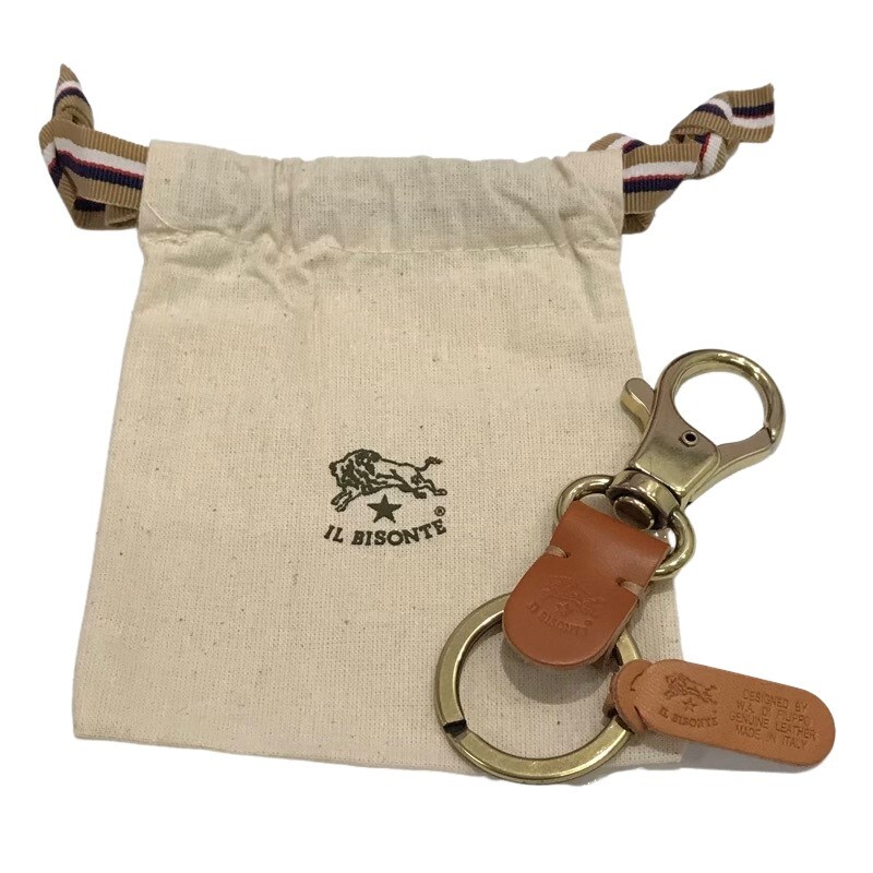 【未使用】IL BISONTE イルビゾンテ キーホルダー SKH016 PG0001 C0551 キャラメル CA101 / 145 保存袋付属 キーリング 【未使用保管品 ...
