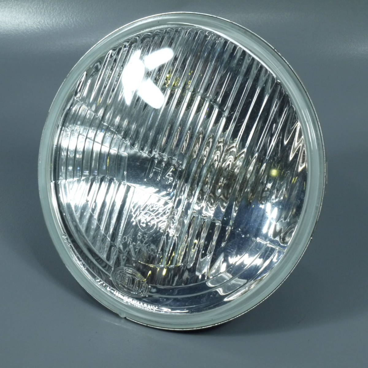 【傷や汚れあり】ハーレー純正ヘッドライト HELLA 7インチ(177.8mm)リム無 FLSTC,ソフテイル, 50R-0034-302 ...