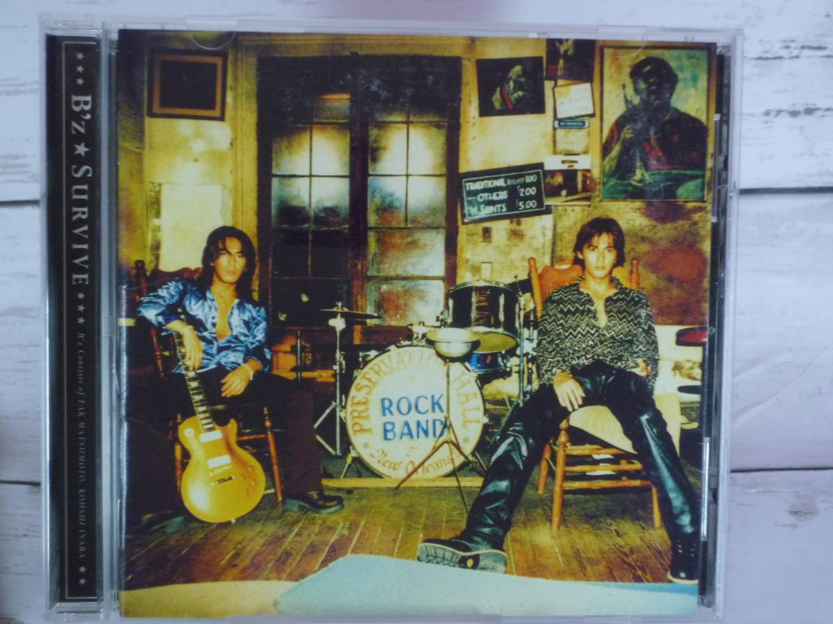 【目立った傷や汚れなし】CD B’Z 『SURVIVE 』 ★B’Z・9作目のオリジナル・アルバム 「Shower」「Liar!Liar!」「FIREBALL」他、全13曲収録 C4106の ...