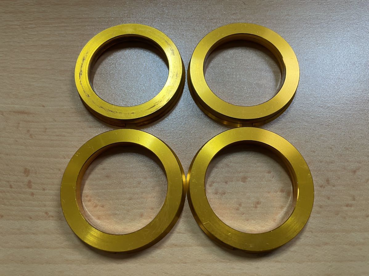 【傷や汚れあり】中古）協永産業 ハブリング KYO-EI HUB CENTRIC RING 73mm/54mm ツバ付 アルミ製/ゴールド 4 ...