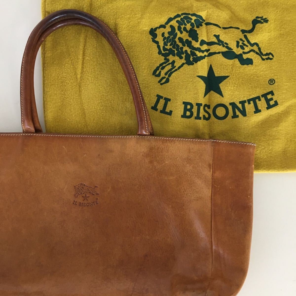 【傷や汚れあり】★ IL BISONTE レザー トートバッグ キャメル (保存袋付) ロゴ入り 裏キャンバス ハンドバッグ イタリア製 イルビソンテ W6 ZろZTJ-01の落札情報詳細 ...