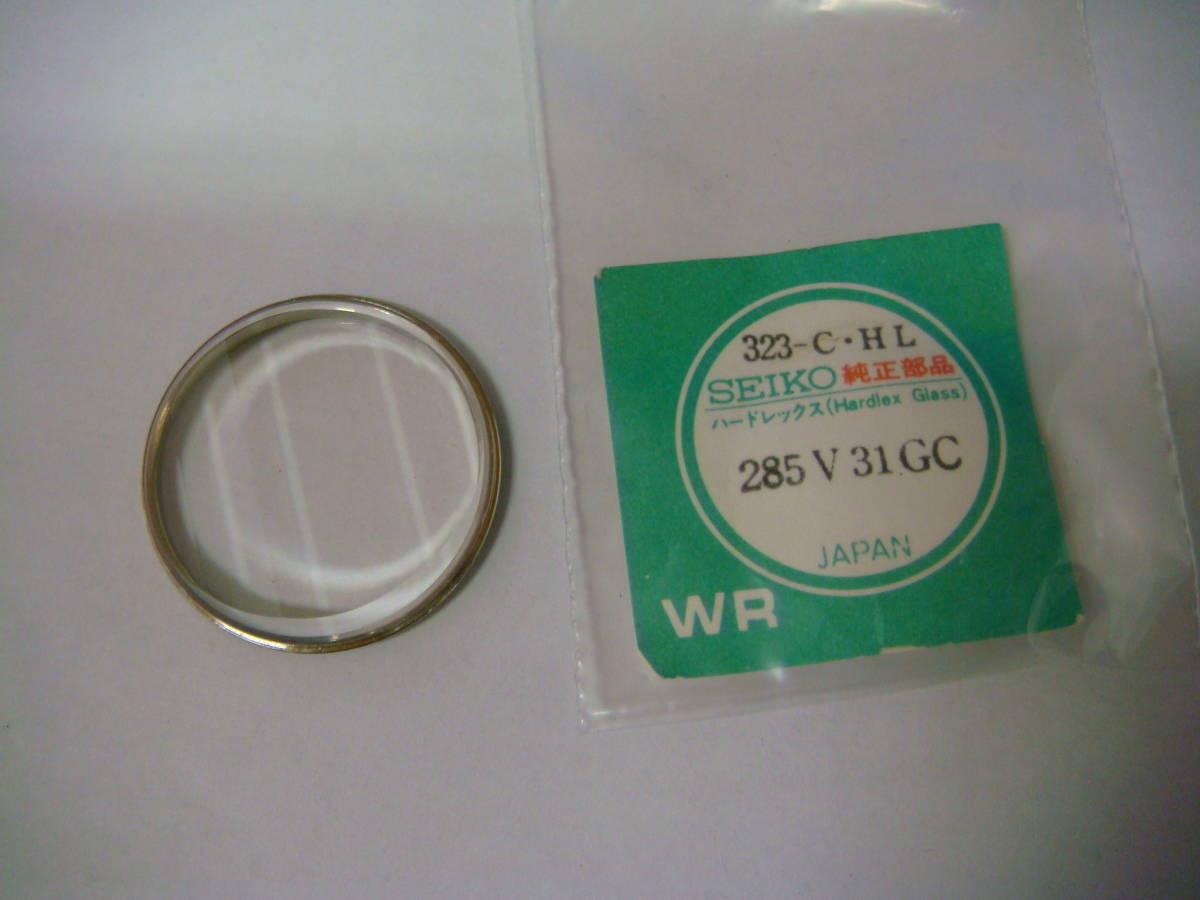 【新品】 719N【時計部品～風防】（323）セイコーLM5216-6000/エルニクス0703・0723 純正ガラス銀ワク5面カット ...