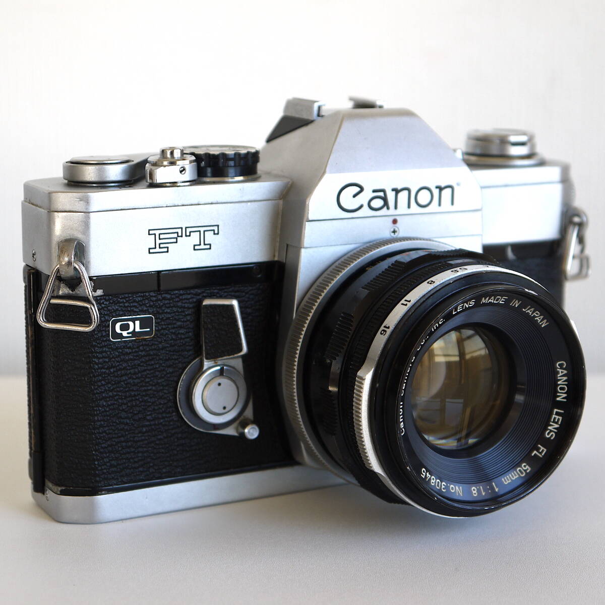 【目立った傷や汚れなし】Canon FT QL 純正セット キャノン FL50mm 1:1.8レンズ付「フクロウの眼を持つ一眼レフ ...