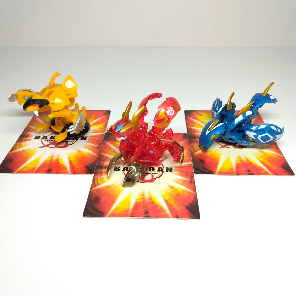 【傷や汚れあり】爆丸 煌 ドラガオンG クリア レッド メタル カード 大量 まとめ セット Bakugan Translucent ...