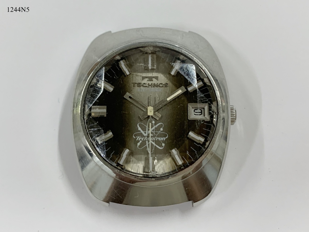 ★TECHNOS TECHNOTRON テクノス テクノトロン エレクトロニック 電磁テンプ 腕時計 カットガラス デイト ジャンク ...