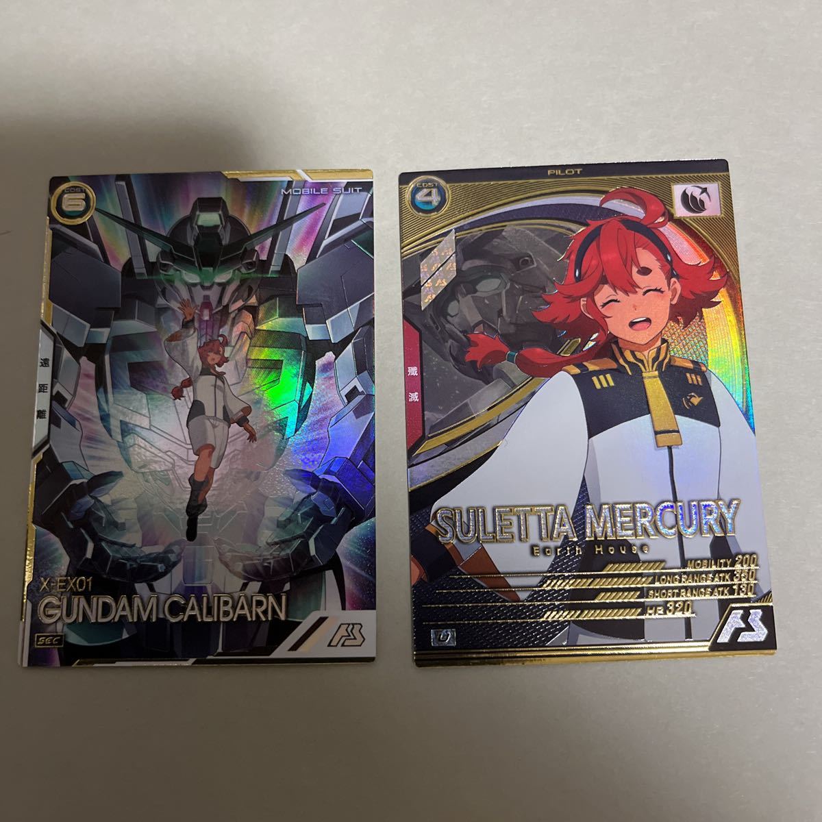 【未使用】機動戦士ガンダム アーセナルベースLINXTAGE season:3 Uレア LX03-112 スレッタ・マーキュリー/LX03-059 ガンダム・キャリバーン 2枚セットの落札情報 ...