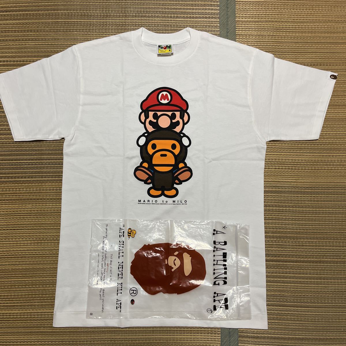 【未使用】激レア 新品未使用 A BATHING APE BAPE KAWS BABY MILO MARIO マリオ tee tシャツ M ...