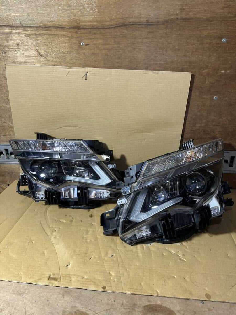 【やや傷や汚れあり】美品 送料無料 E52 エルグランド 後期 純正 LED ヘッドライト 左右 セット ブラック インナー 100-23674 PE52 PNE52 TE52 TNE52の ...