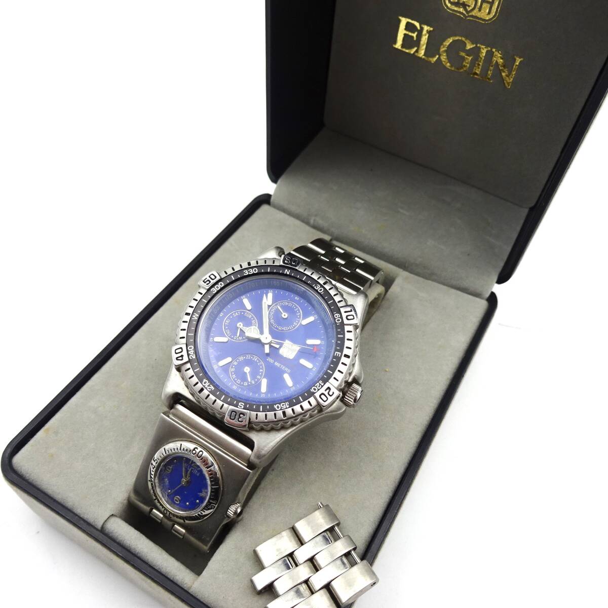 【やや傷や汚れあり】7709901-4【ジャンク品】ELGIN/エルジン/FK-990E/ダブルフェイス/腕時計/時計/QZ/ネイビー文字盤/ラウンド/シルバー/コマ・箱付き/ジャンクの落札 ...