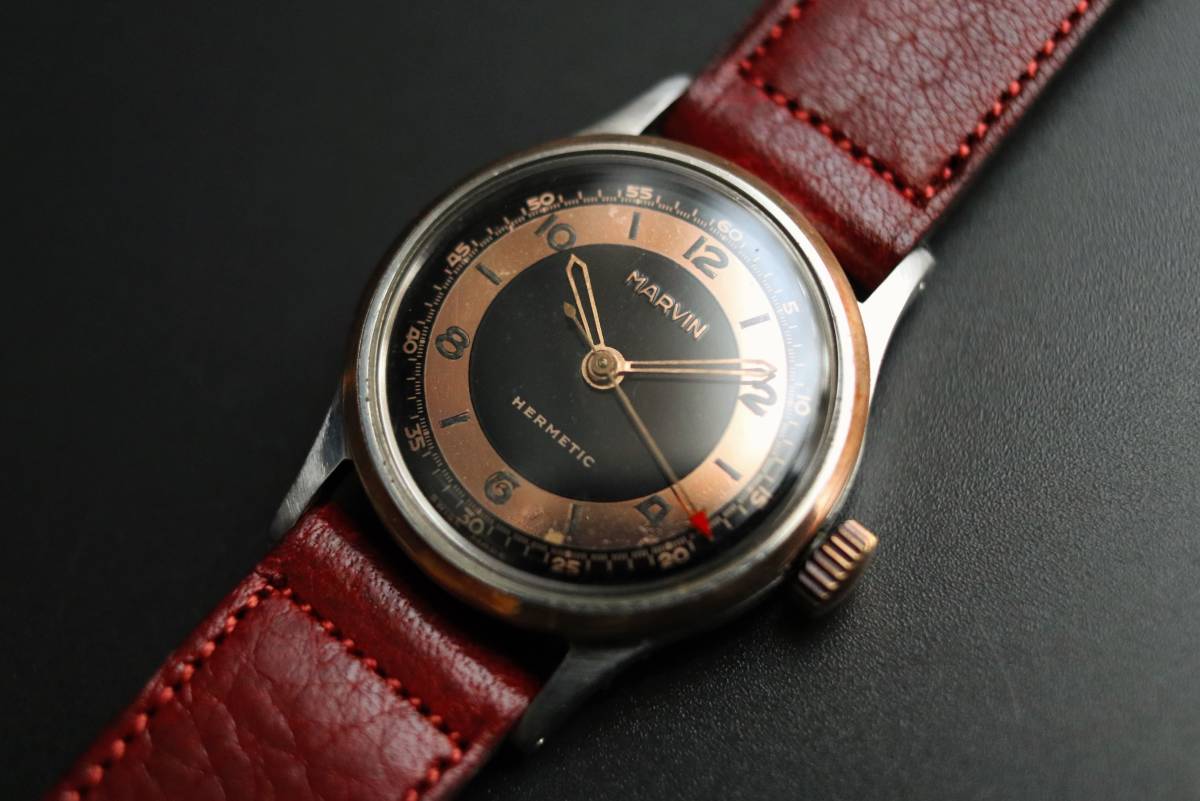 【全体的に状態が悪い】OH済【特価～】MARVIN マービン HERMETIC Cal.560 スクリューバック防水 飛びローマン ブラックミラー ギルトダイアル 手巻き ジャンク扱の落札情報 ...